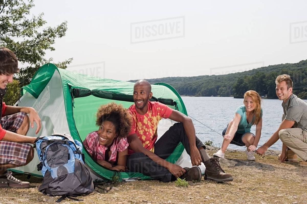 Friends camping - Stock Photo - Dissolve
