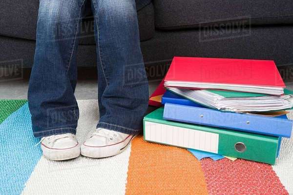 Human legs and ring binders - Royalty-free Stock Photo | Dissolve