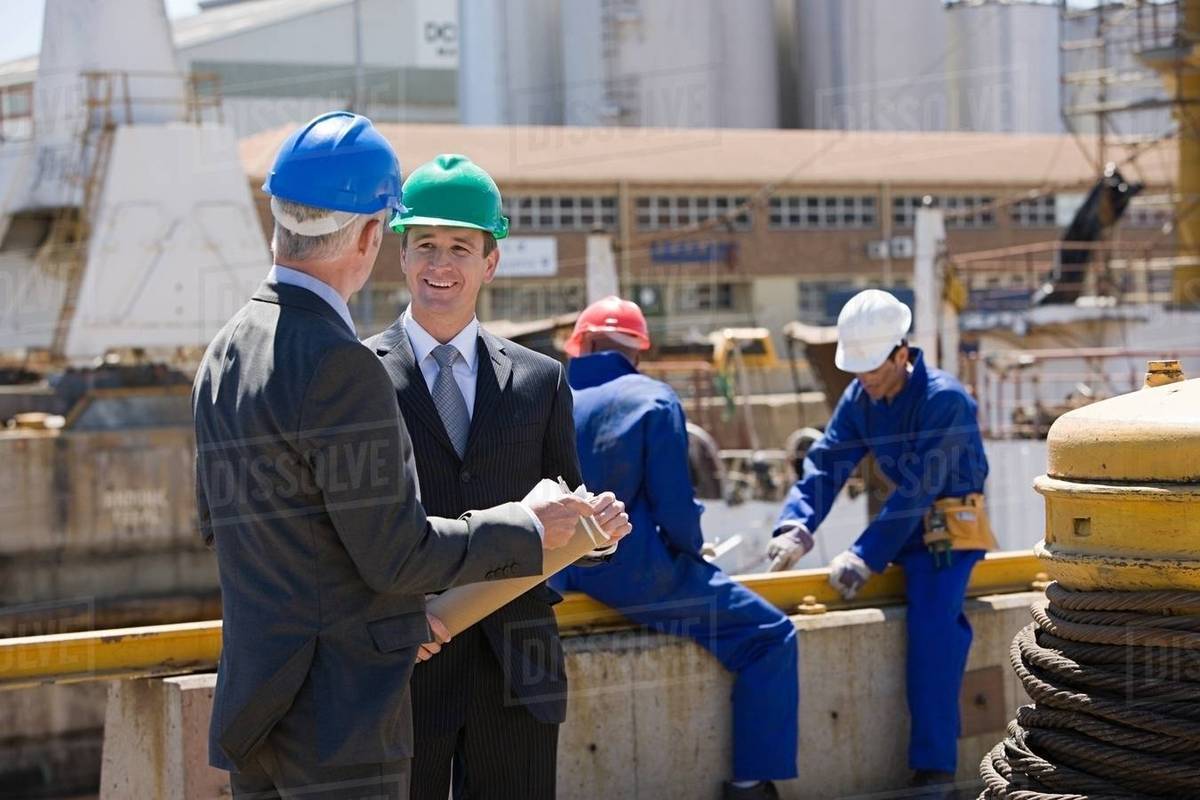 Engineers at harbour - Royalty-free Stock Photo | Dissolve