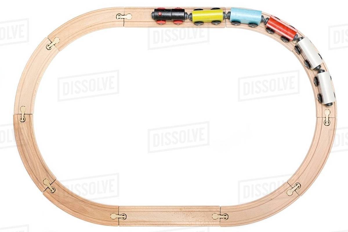 Toy train on track - Stock Photo - Dissolve