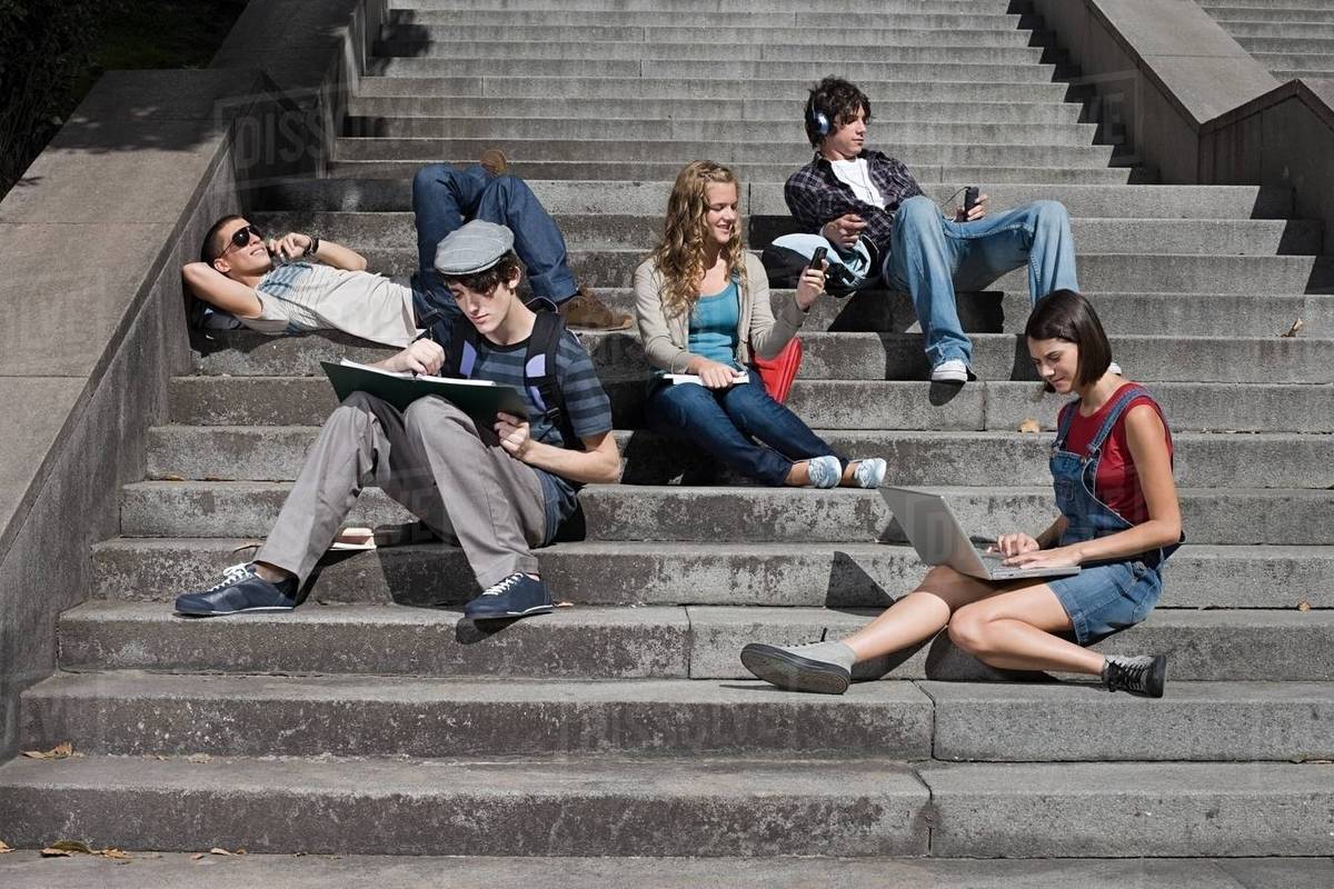 High school students sitting on steps - Royalty-free Stock Photo | Dissolve
