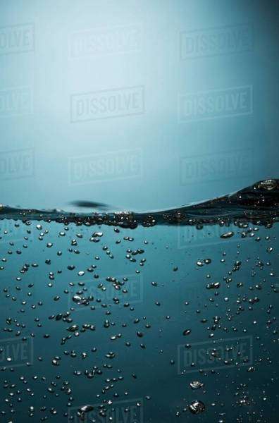 Bubbles floating in water - Stock Photo - Dissolve
