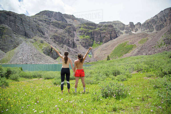 Women baring chest, Cathedral Lake, Aspen, Colorado - Stock Photo ...