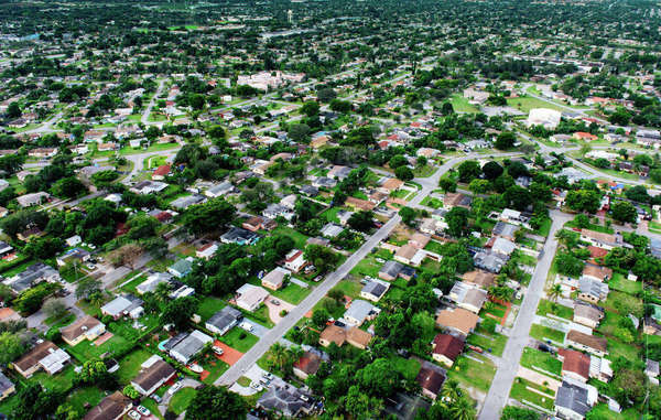Aerial view of residential structures in urban sprawl, Miami, Florida ...