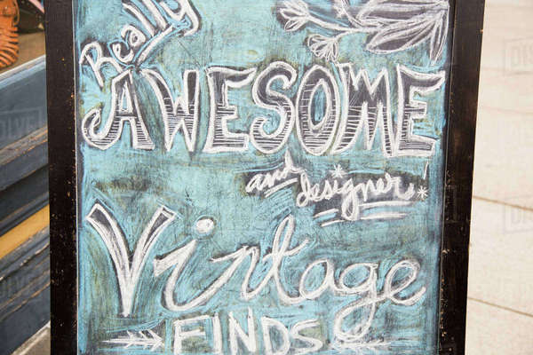 Handwritten signage of vintage shop - Stock Photo - Dissolve