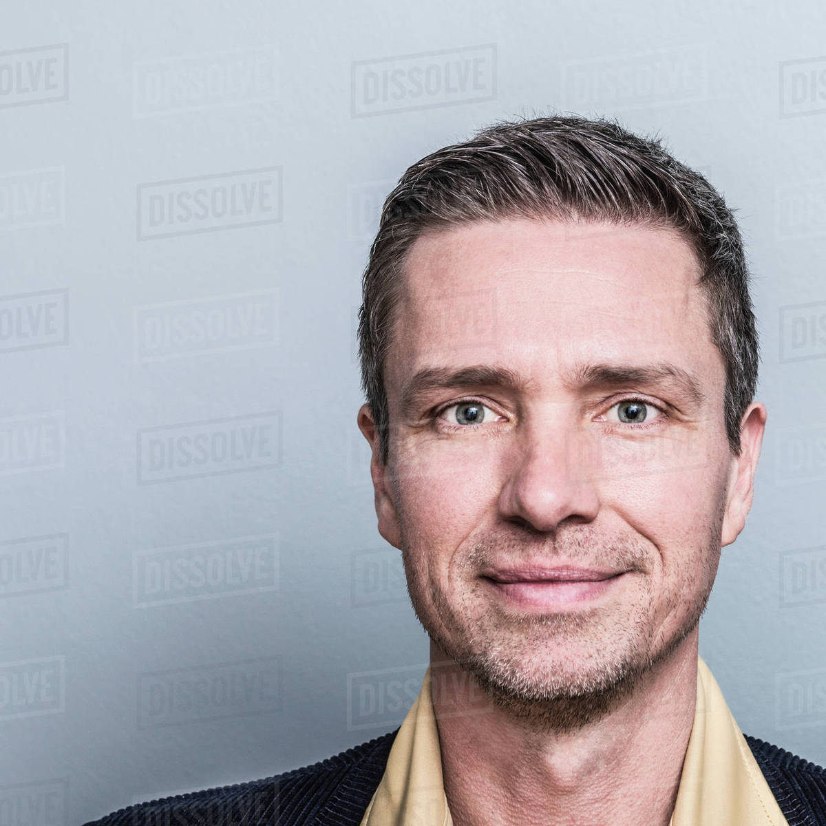 Portrait of man looking at camera smiling - Royalty-free Stock Photo ...