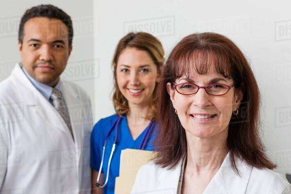 Medical professionals together in hospital, portrait - Royalty-free ...