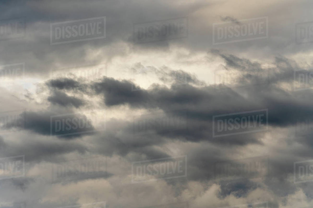 Dramatic thunderstorm clouds in dusk sky during rain. Amazing view of ...