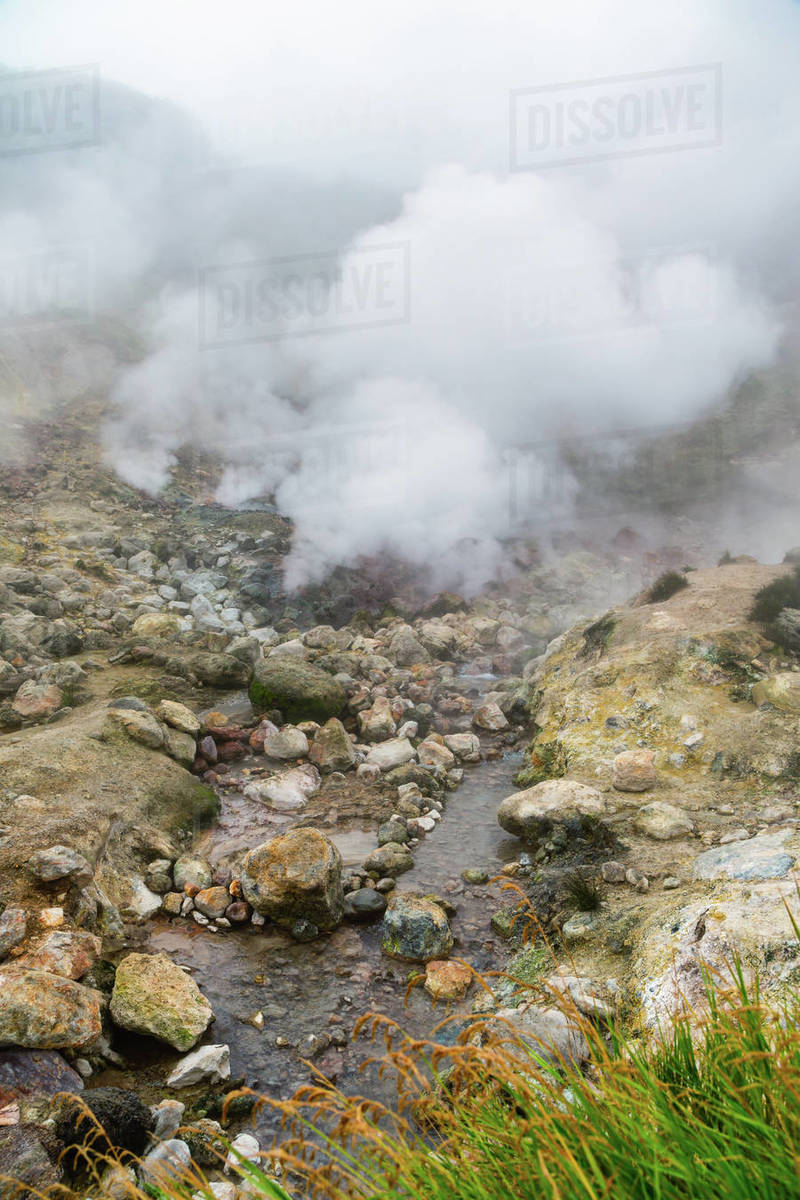 Breathtaking scenery view of volcanic landscape, aggressive hot springs ...