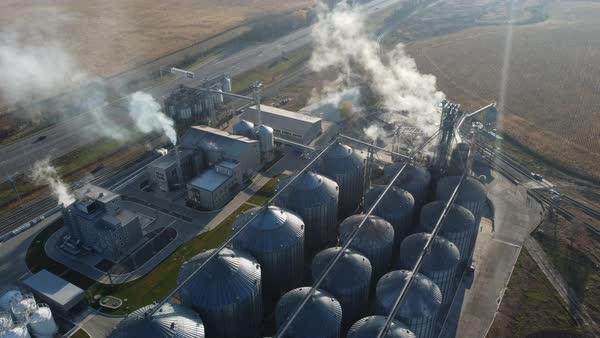Grain elevator. Granary. Large metal structure grain elevator. Storage ...