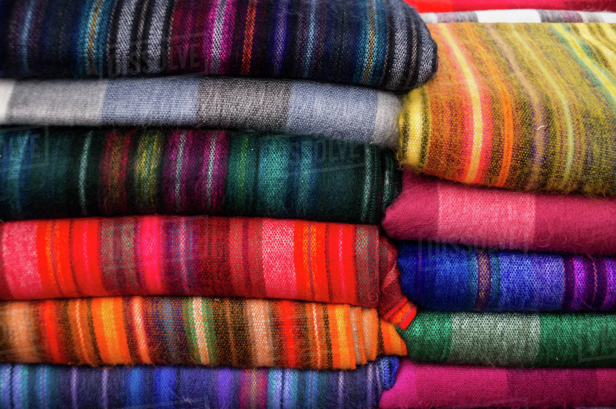 Beautiful multicolored textiles in all colors of the rainbow - Otavalo ...