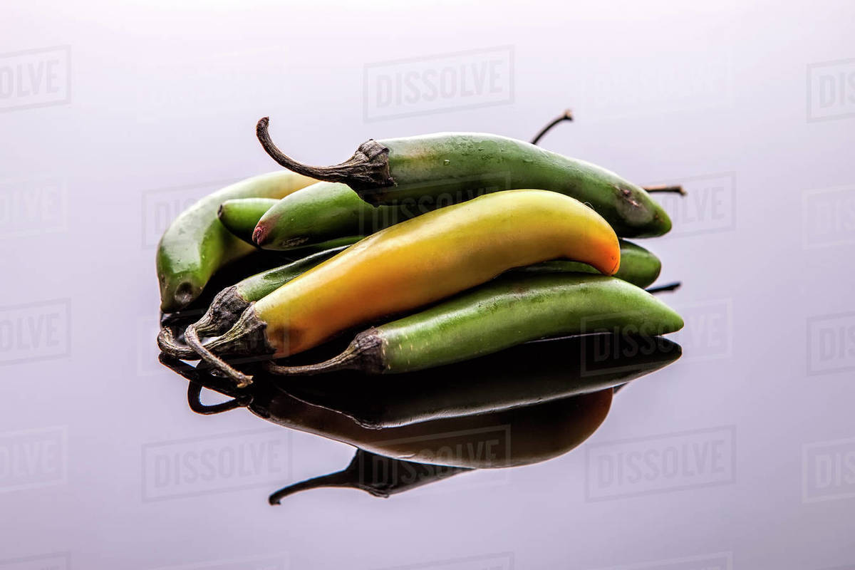 A close up studio image of a bunch of jalapeno peppers. - Royalty-free ...