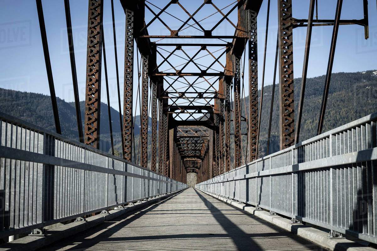 An old steel bridge repurposed into a walking path near Clark Fork ...