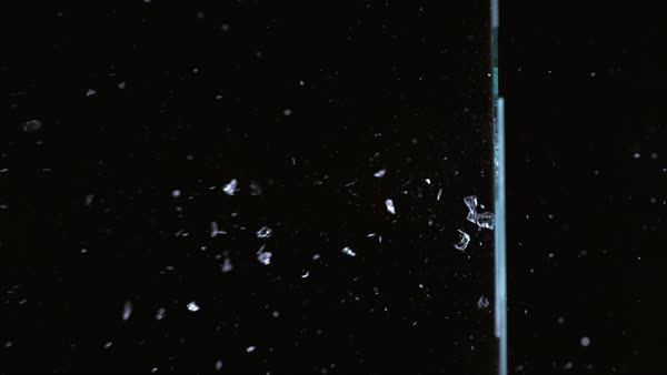 Slow motion shot of bullet shooting through glass. camera. - 4K Royalty ...
