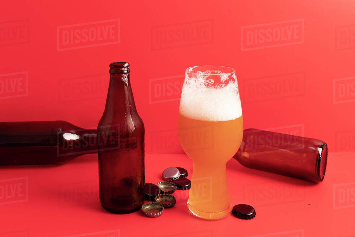 IPA beer glass and various bottles - Royalty-free Stock Photo | Dissolve