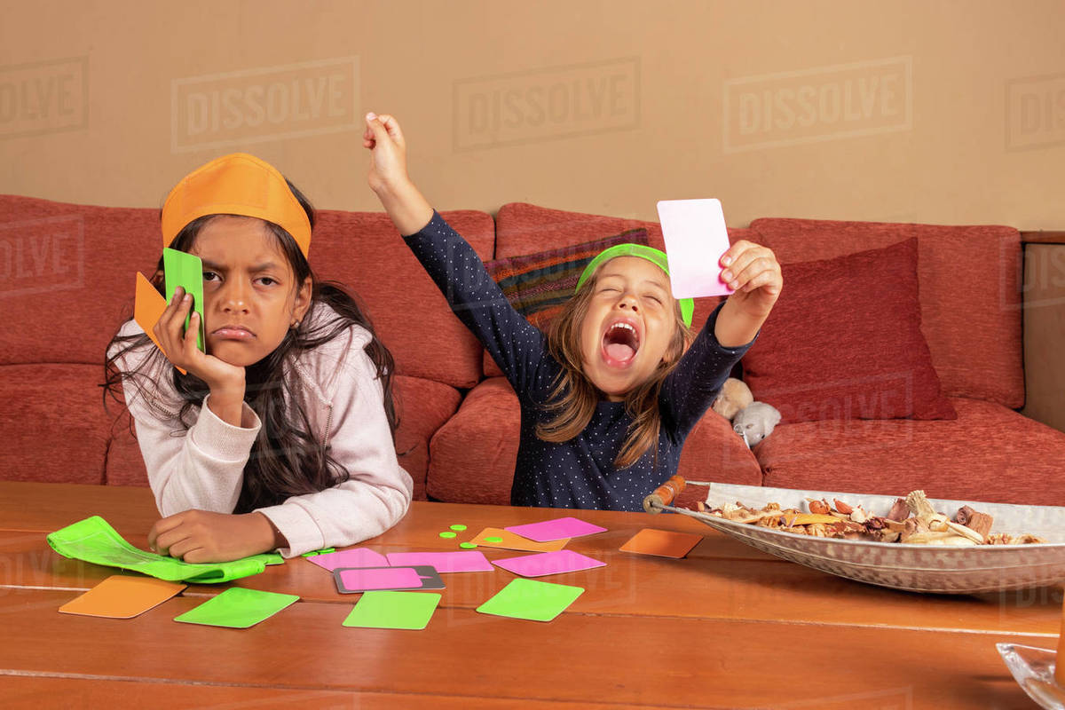 Girl celebrates after winning her card game - Royalty-free Stock Photo ...