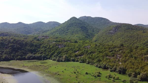 The beauty of a mountain valley with long narrow river. Untouched ...