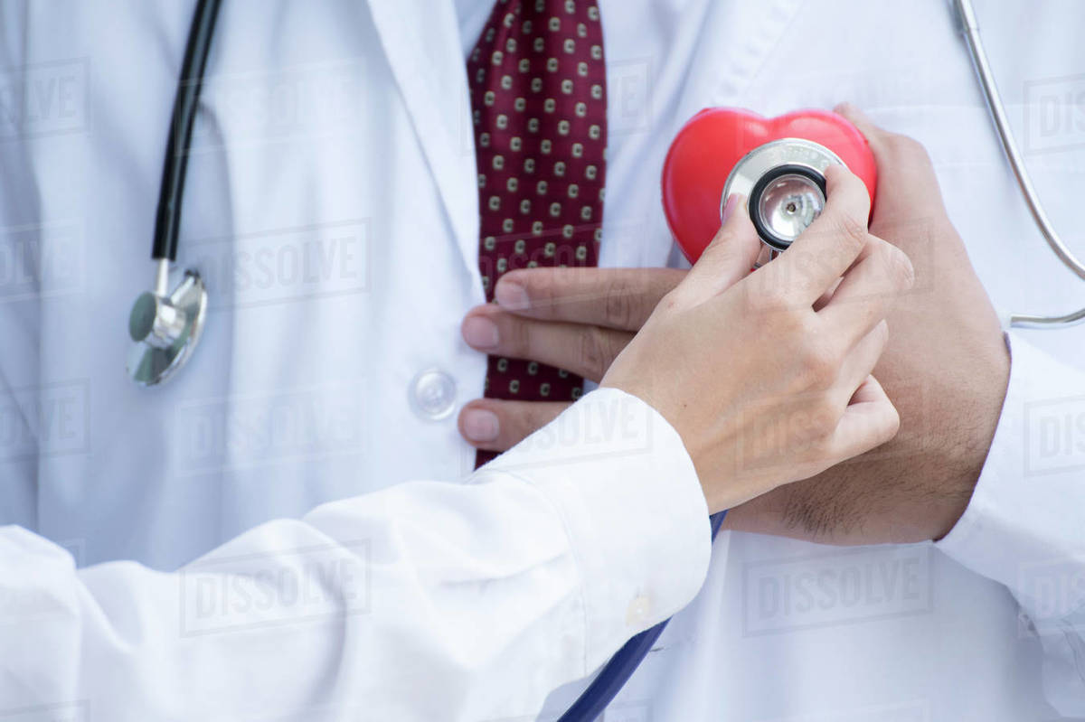 Doctor checking heart rate. Diagnosis by using stethoscope. Healthcare ...