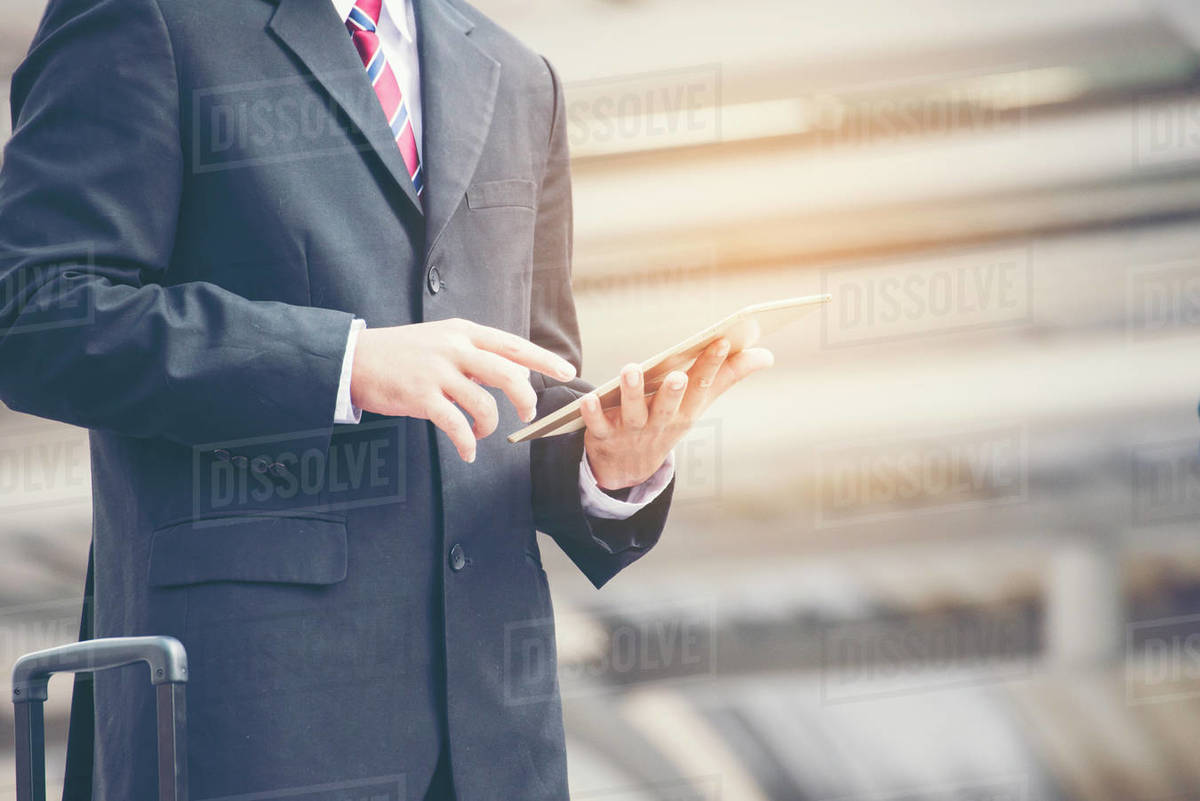 Leader young executive businessman standing in modern city background ...