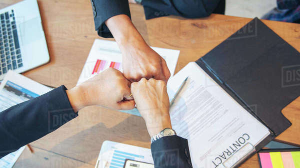 Group of diverse people fist bump hands together - Royalty-free Stock ...