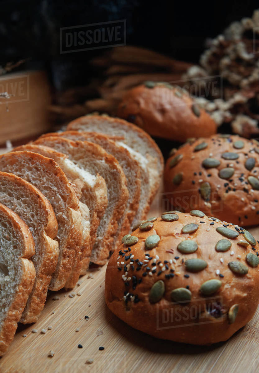 Whole grains buns and sliced whole wheat bread - Royalty-free Stock ...