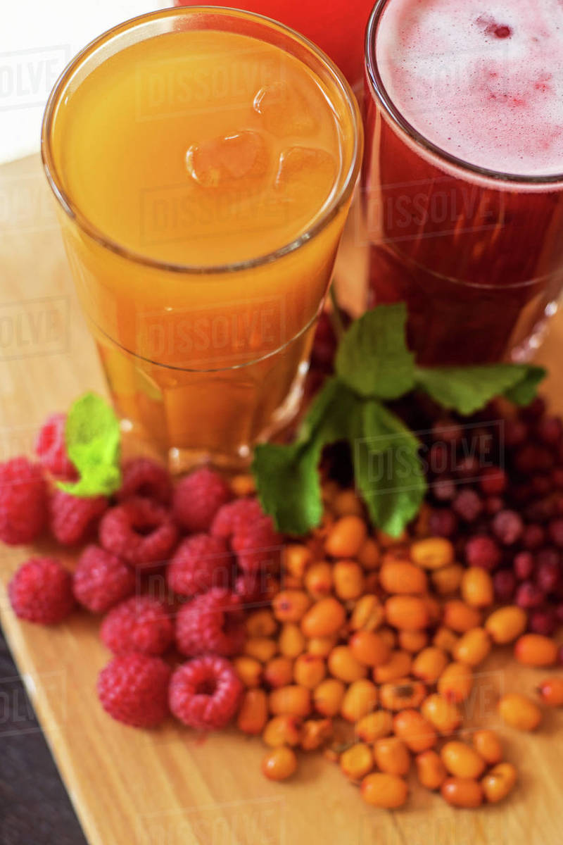 Set of fruit non-alcoholic drink with cranberries raspberries and sea ...