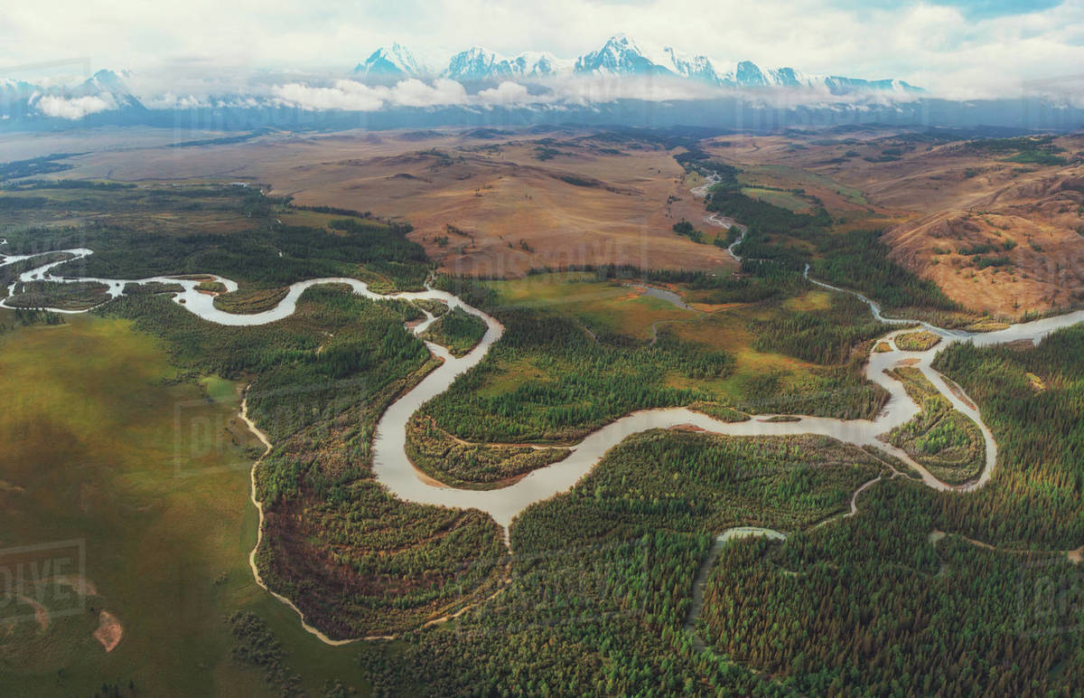 Kurai steppe and Chuya river on North-Chui ridge background. Altai ...
