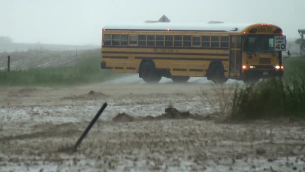 School bus turning in flood - HD Royalty-free Stock Video Footage ...