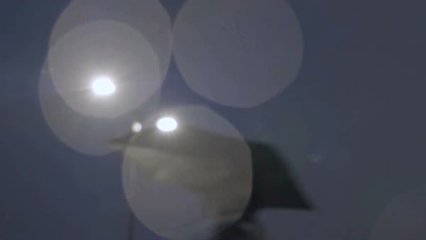Lens flare from illuminated street lights at night. - Stock Video ...