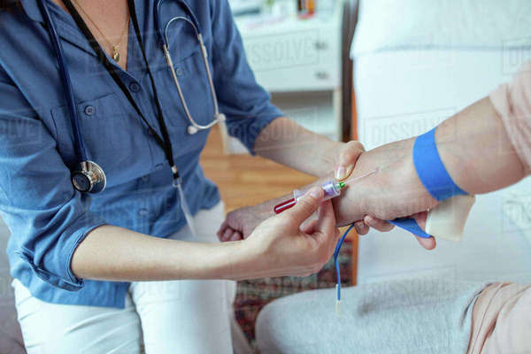 Close up of Nurse Taking Blood Samples from Elderly Patient. Female ...