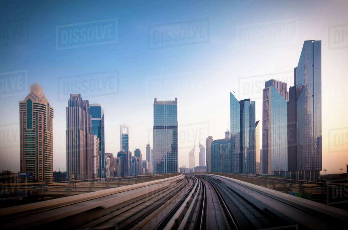 Sheikh Zayed road and metro railway. Sunrise in Dubai. - Royalty-free ...