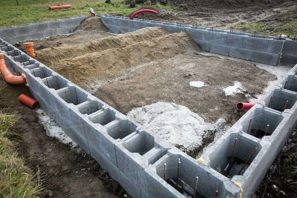 Foundations of the house, unfinished bungalow, rough construction ...