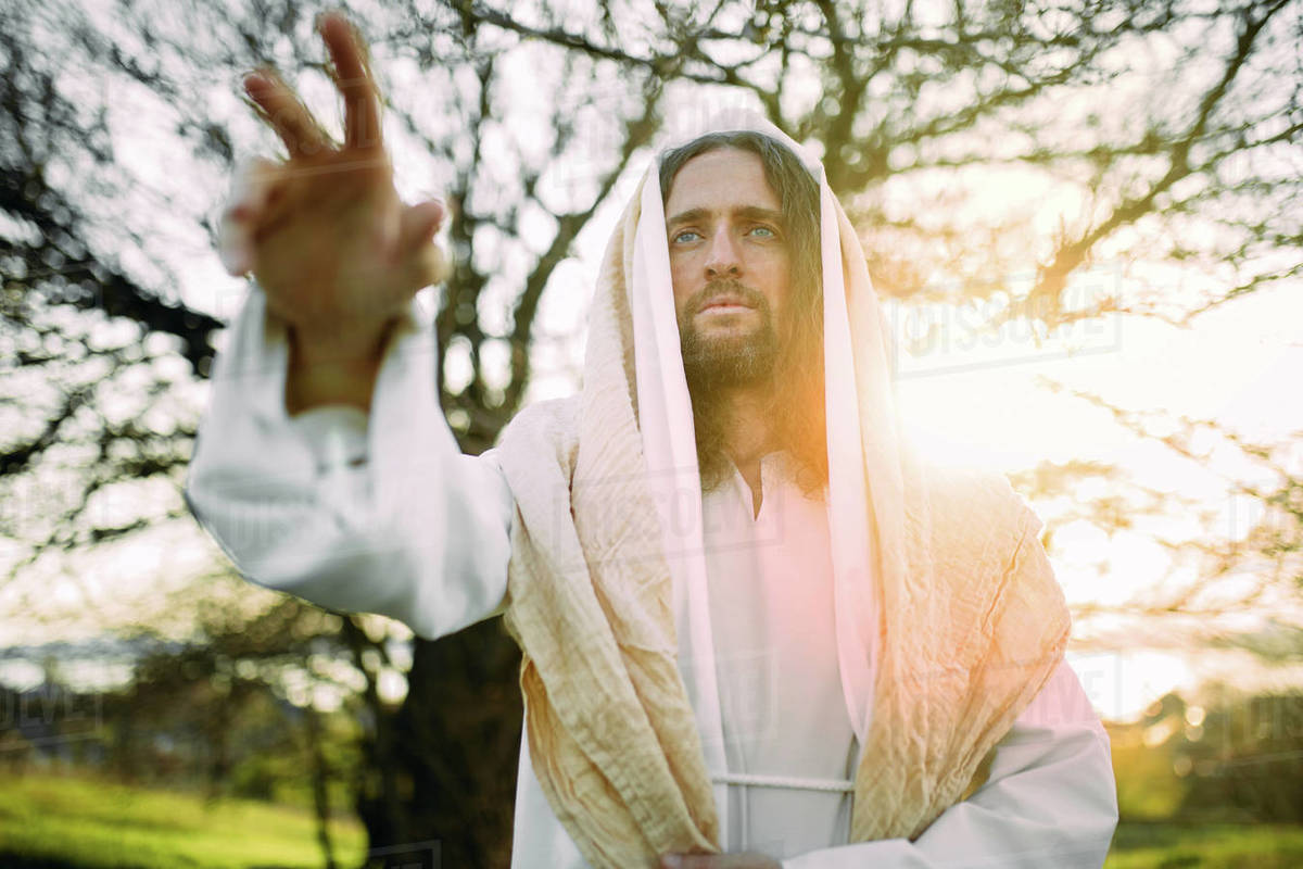 Prophet standing in meadow and preaching Christian faith conversion ...