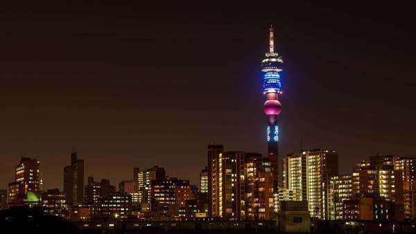 Static medium timelapse of the Hillbrow Tower, over the city centre of ...