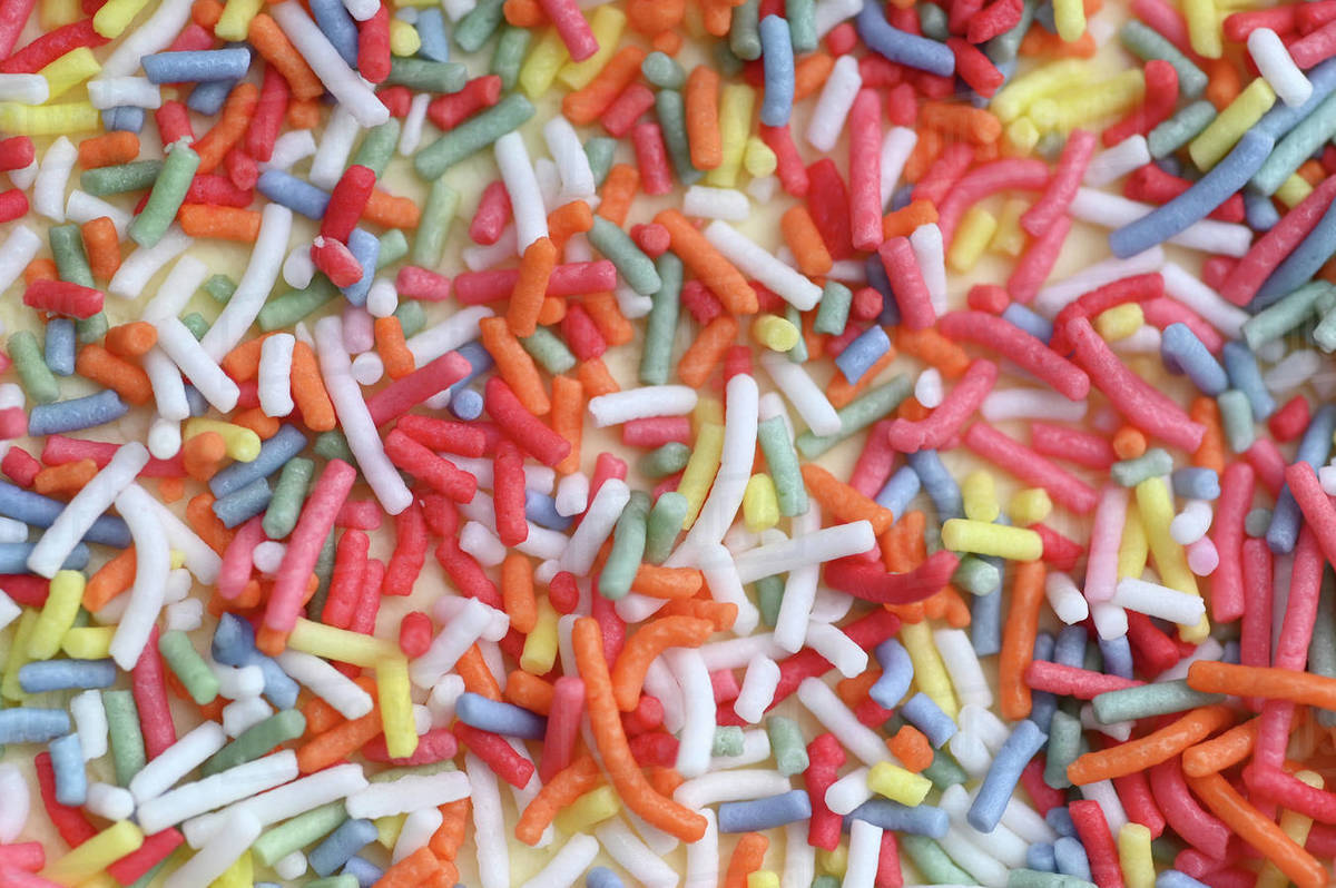 Colorful sugar strands sprinkles abstract background and texture ...