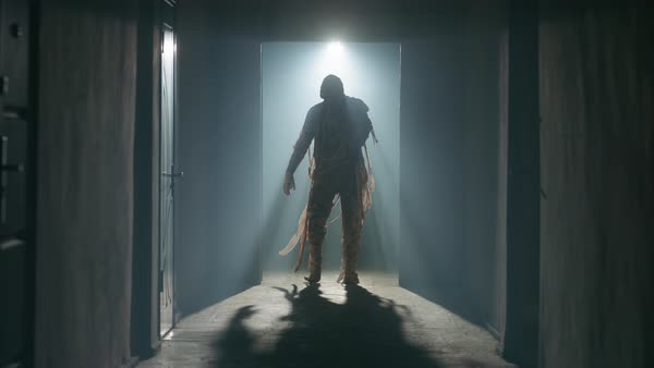 Scary Egyptian mummy creeping down hallway in abandoned cursed house ...