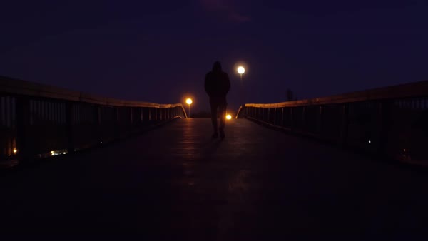 Silhouette Of Sad Man Walking On Bridge At Night Social Distance Travel ...