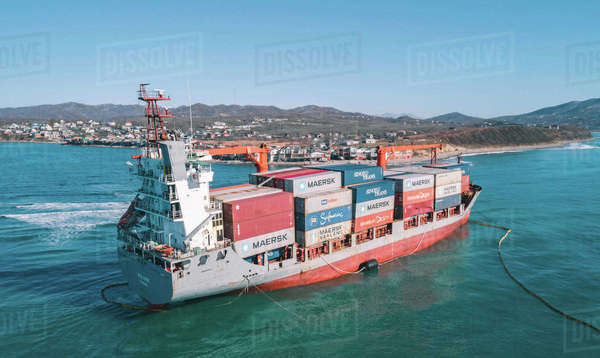 Aerial view of a RISE SHINE container cargo ship stands aground after a ...