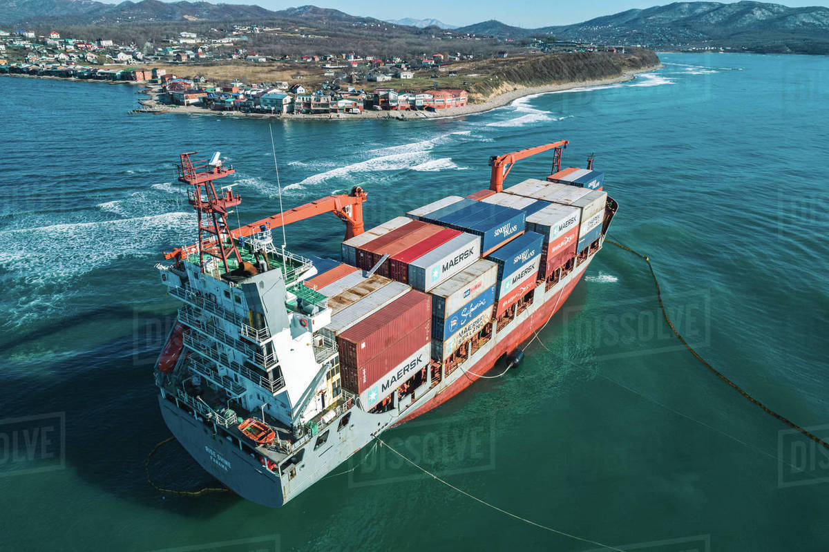 Aerial view of a RISE SHINE container cargo ship stands aground after a ...