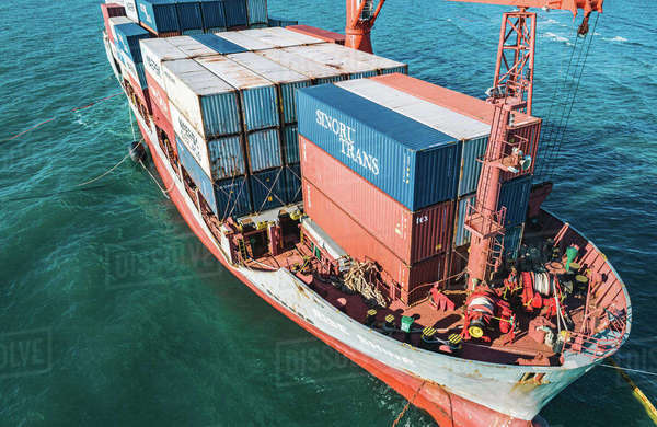 Aerial view of a RISE SHINE container cargo ship stands aground after a ...