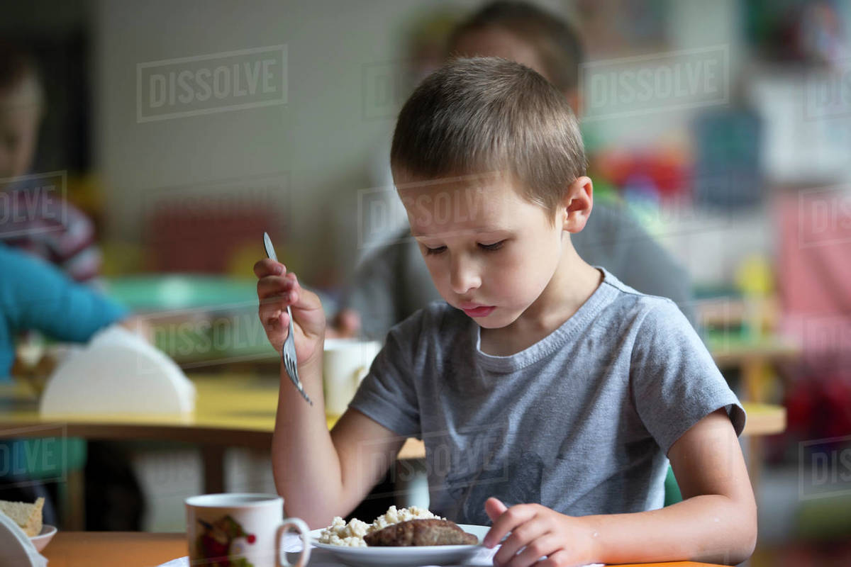 Boy child does not want to eat. Bad appetite. Eating in kindergarten ...