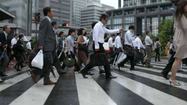 Morning scenery of the people going to work in Tokyo station - Stock ...