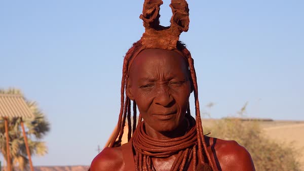 Close up portrait of a Himba tribal African woman face with mud ...