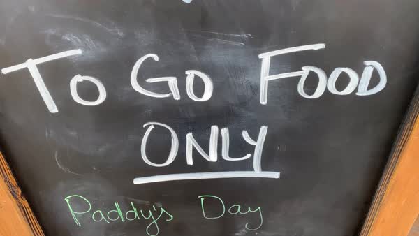 2020 - a sign outside a restaurant indicates that carry out or to go ...