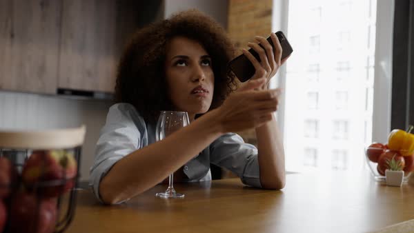 Young drunk woman calling her ex-boyfriend, alcohol addiction ...