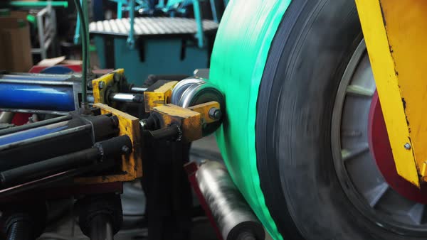 Man repairs a tire from a truck Replaces the coating and glues with a ...
