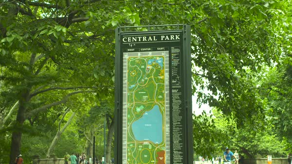 Panning establishing shot of Central Park map. Paths with pedestrians ...
