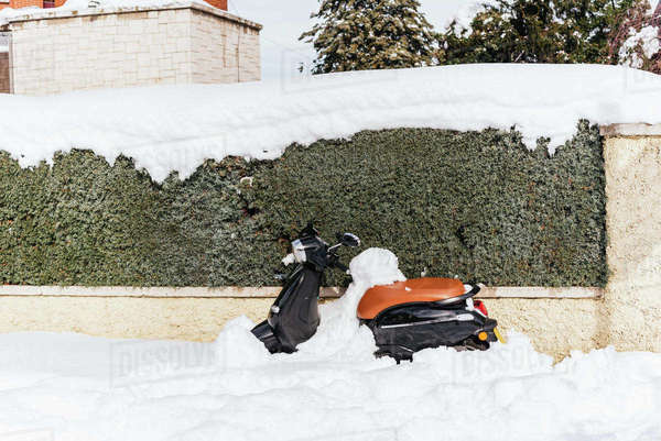 Shot of a motorcycle lost in the snow. - Royalty-free Stock Photo ...