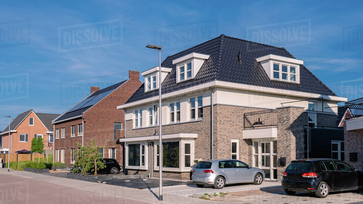 Dutch Suburban area with modern family houses, newly build modern ...
