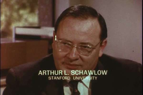 U.S. reporter Walter Cronkite interviews physicist Arthur Schawlow on ...